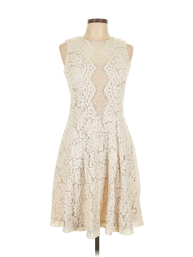 Danny And Nicole Ivory Cocktail Dress Size 10 - 65% off | ThredUp